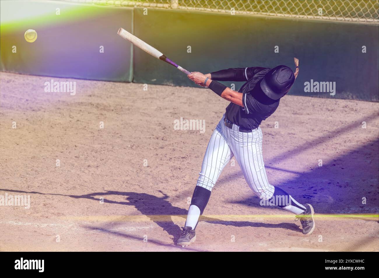 Running female baseball team hi-res stock photography and images - Alamy