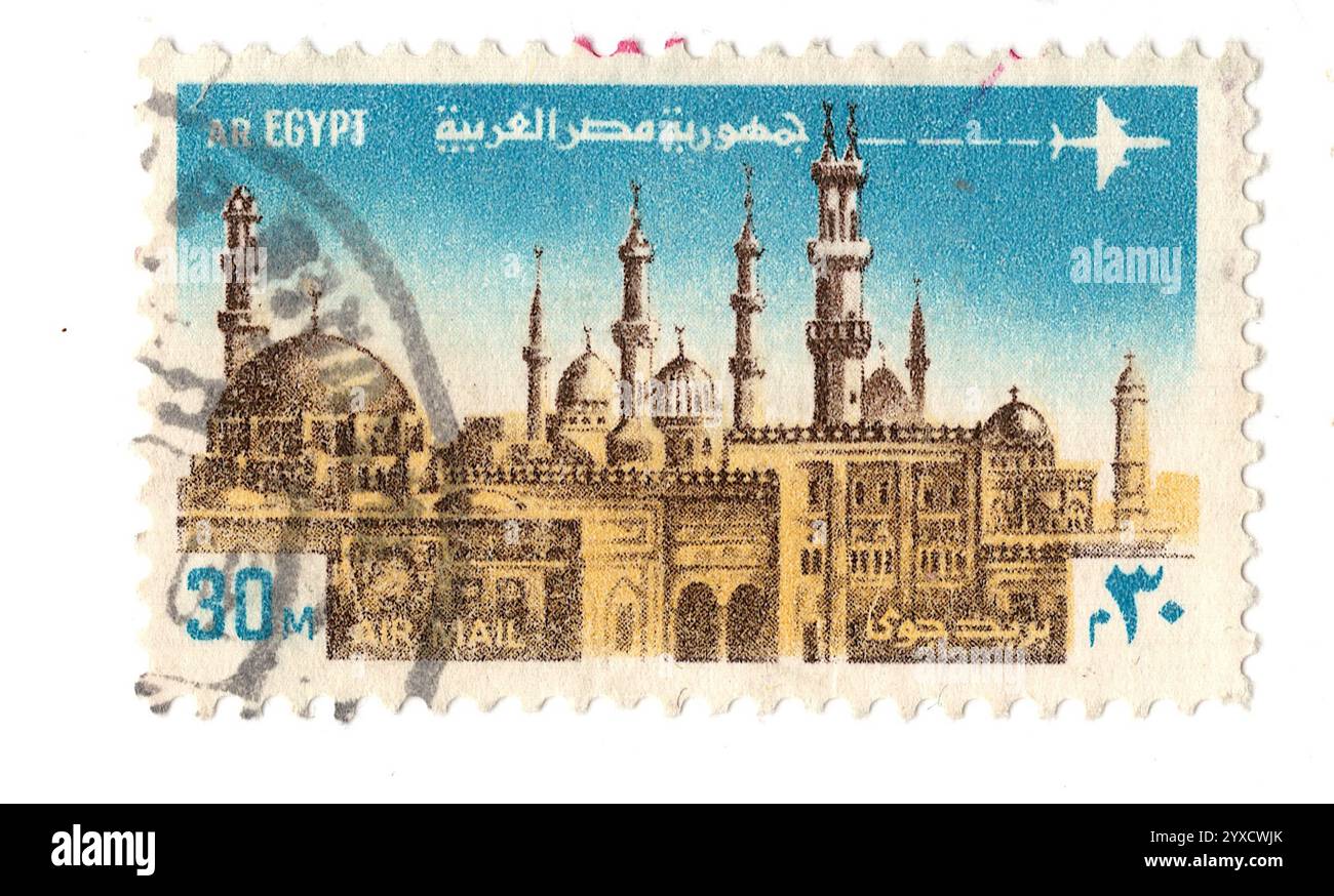 A vintage Air Mail postage stamp from Egypt isolated on a white ...