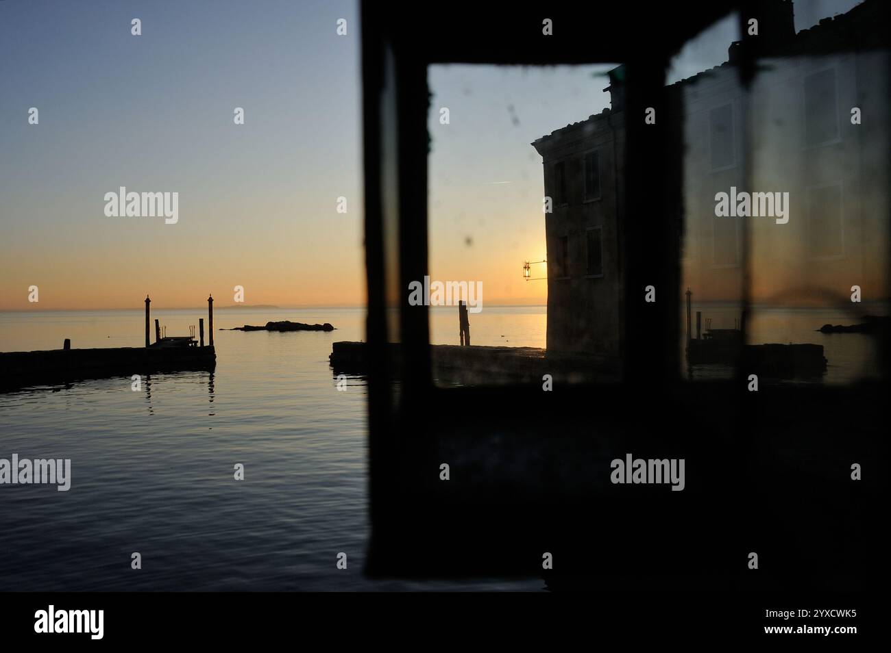 Reflexes of an old marina and cottage at Garda Lake Stock Photo - Alamy