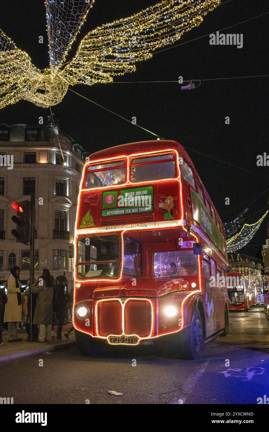 A Routemaster Bus at Night under the Christmas Decorations on Regent ...