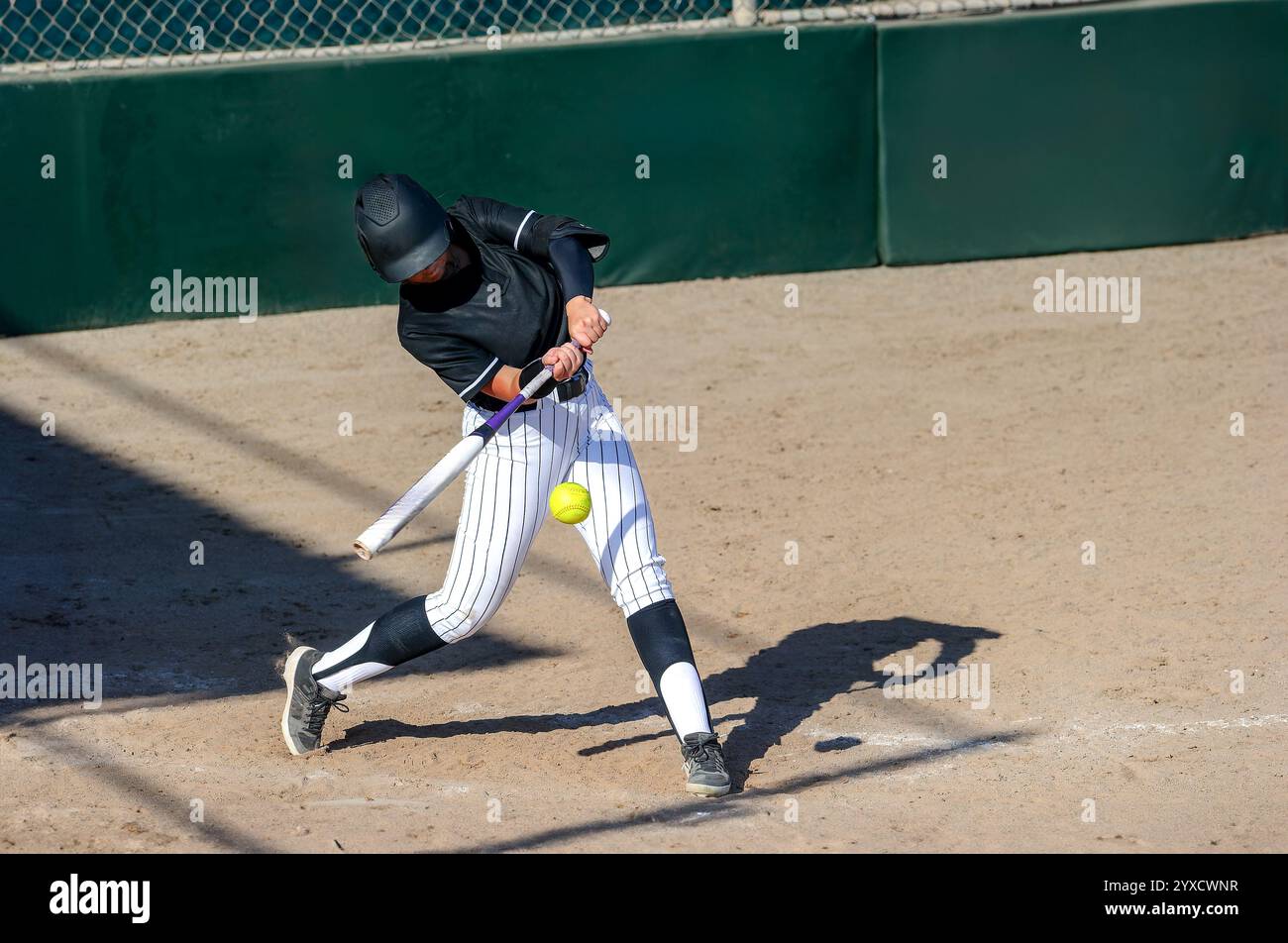 Girl softball player sliding into base hi-res stock photography and ...