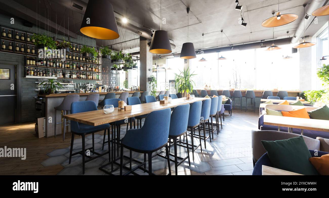 Loft style cafe and bar with luxury alcohol on shelves Stock Photo - Alamy