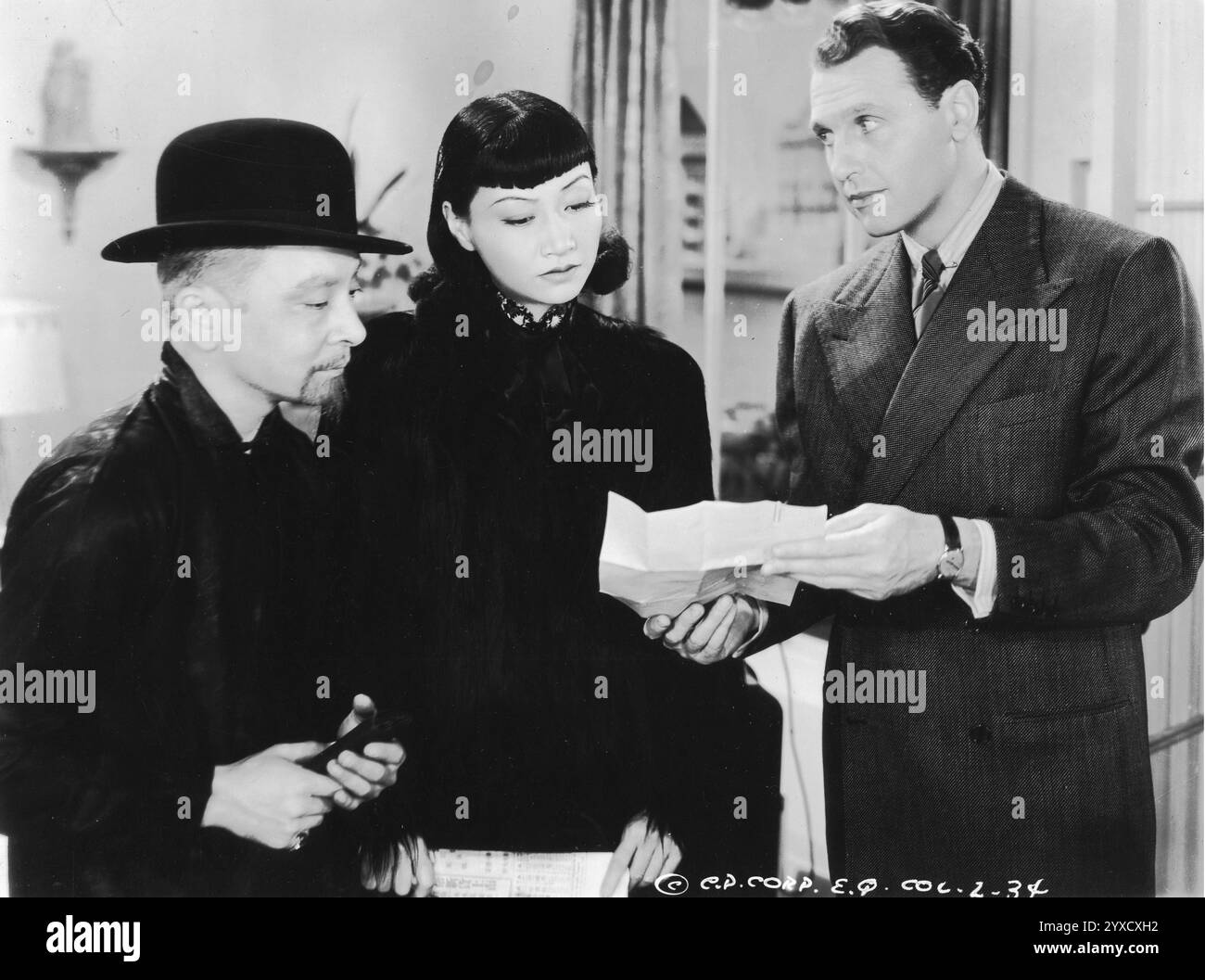 HONORABLE WU, ANNA MAY WONG and RALPH BELLAMY in a scene from ELLERY ...