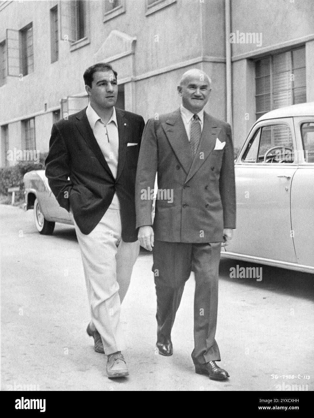 World Heavyweight Boxing Champion ROCKY MARCIANO strolling around the ...