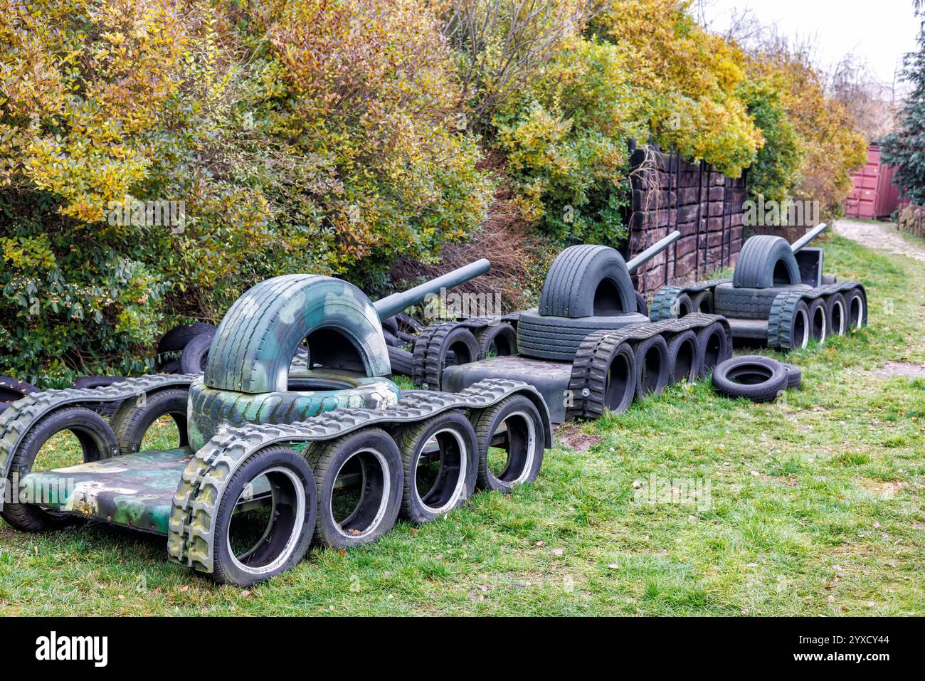 Three tanks made of old tires. Rear view Stock Photo - Alamy