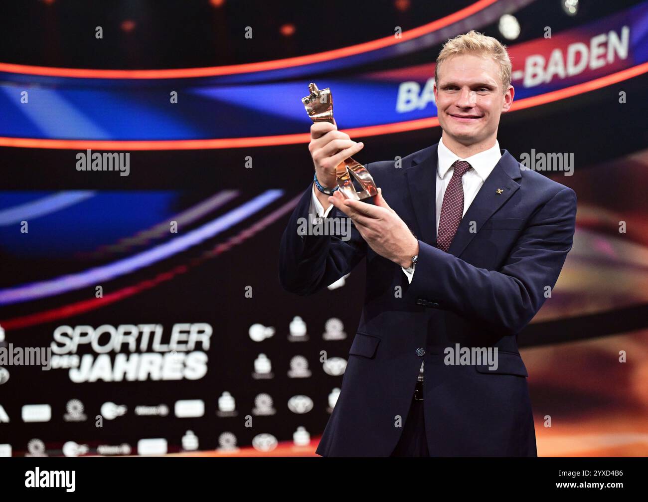 Baden Baden, Germany. 15th Dec, 2024. The rower Oliver Zeidler holds ...