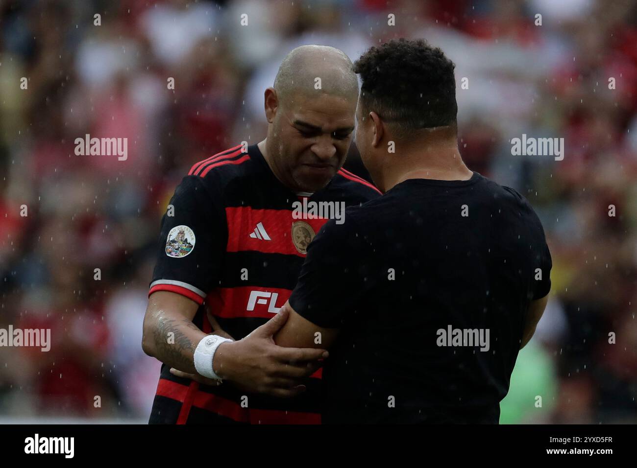 Brazilian former soccer players Adriano, left, and Ronaldo Nazário ...