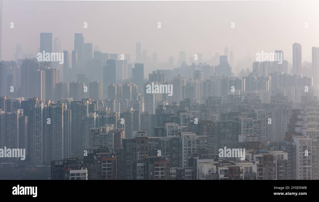 High-rise buildings are seen in downtown Chongqing, China, December 15 ...