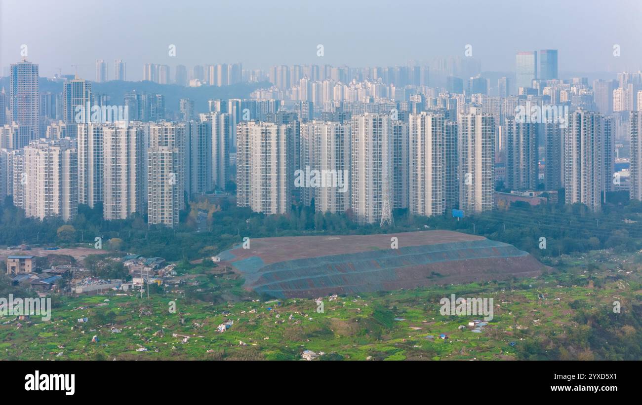 High-rise buildings are seen in downtown Chongqing, China, December 15 ...