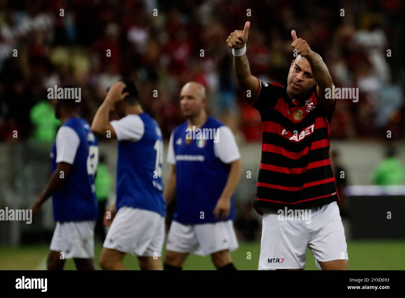 Brazilian former soccer player Adriano gestures to fans during his ...