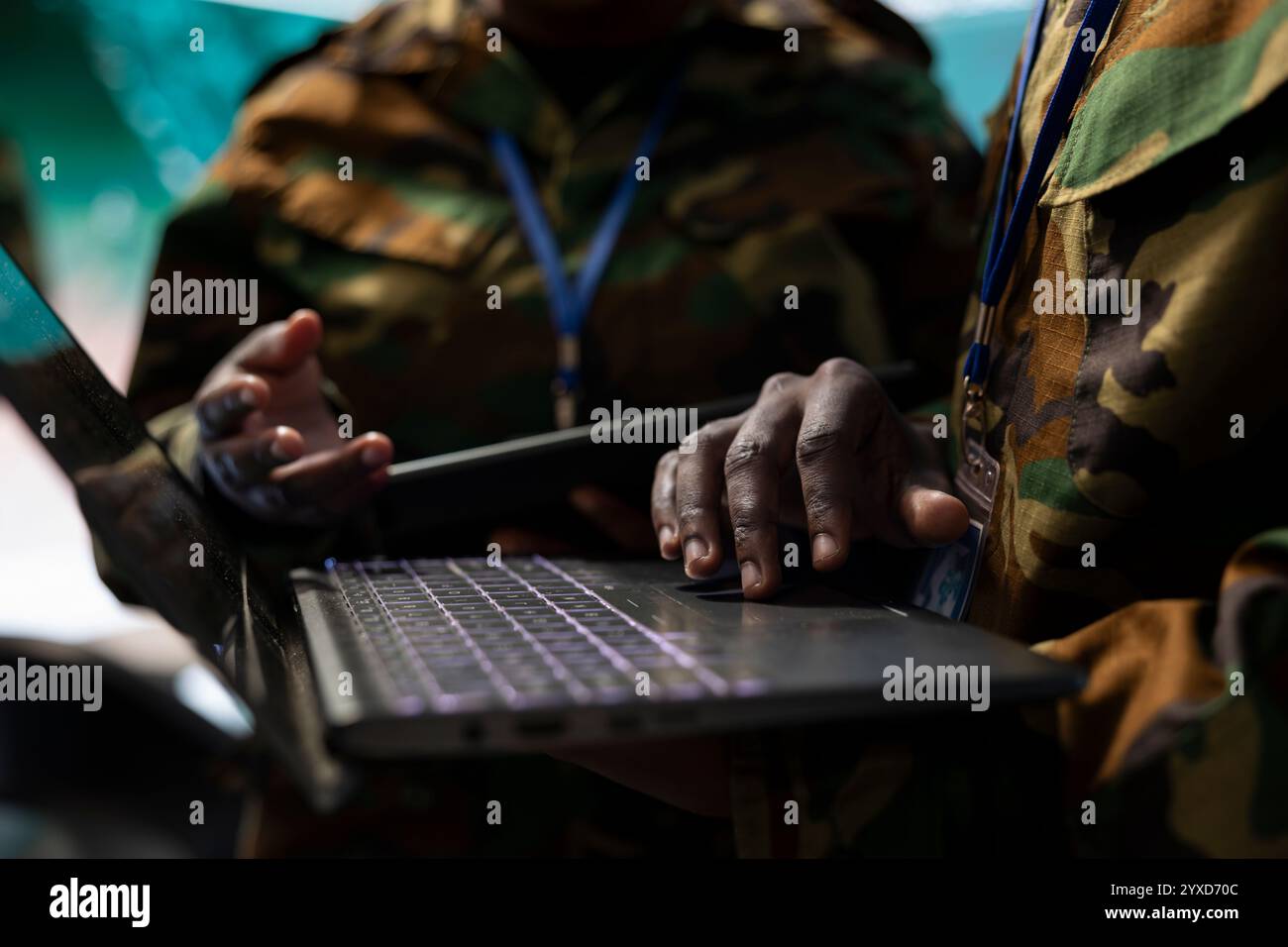 Team of soldiers overseeing air and sea traffic activity for military ...