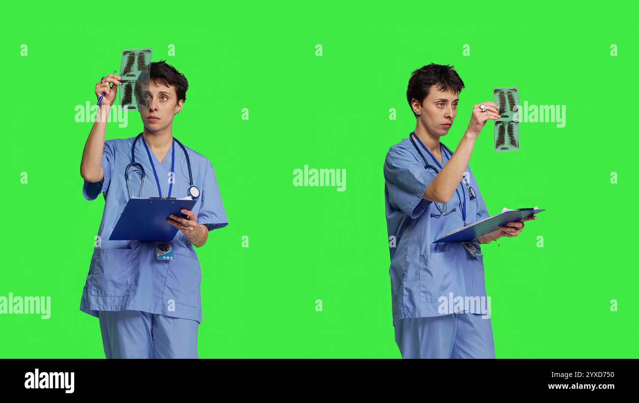 Medical specialist examines x ray scan in hospital laboratory, looking ...