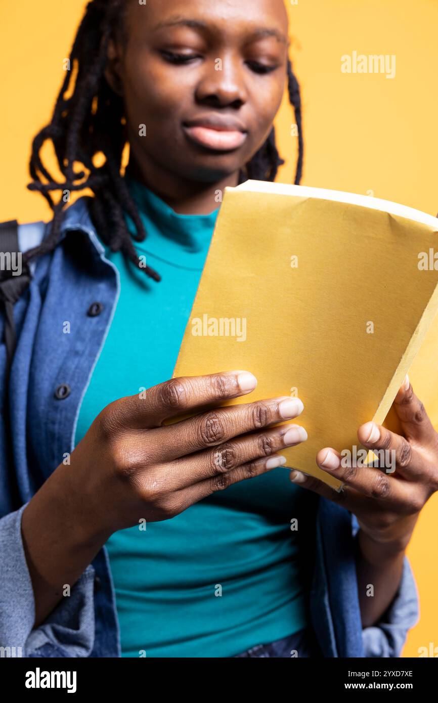 Woman reading interesting book, enjoying hobby, being entertained ...
