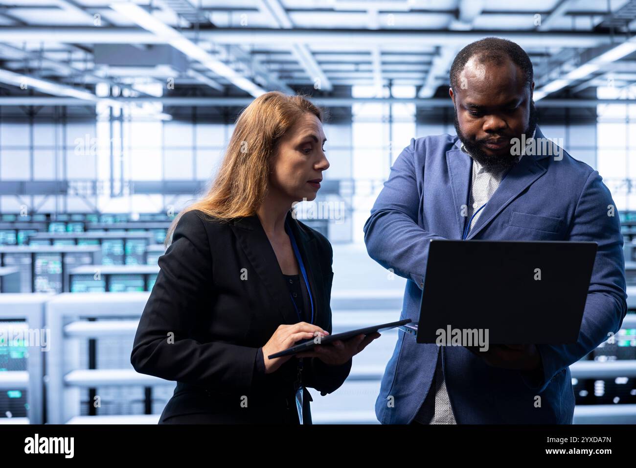 Data center team configuring hi-res stock photography and images - Alamy