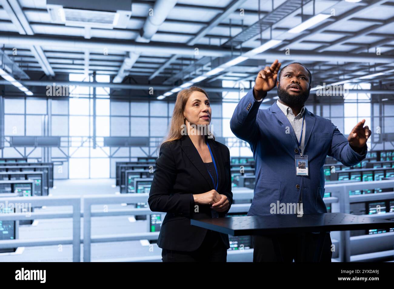 Coworkers using AR in data center, ensuring cybersecurity and efficient network management ...