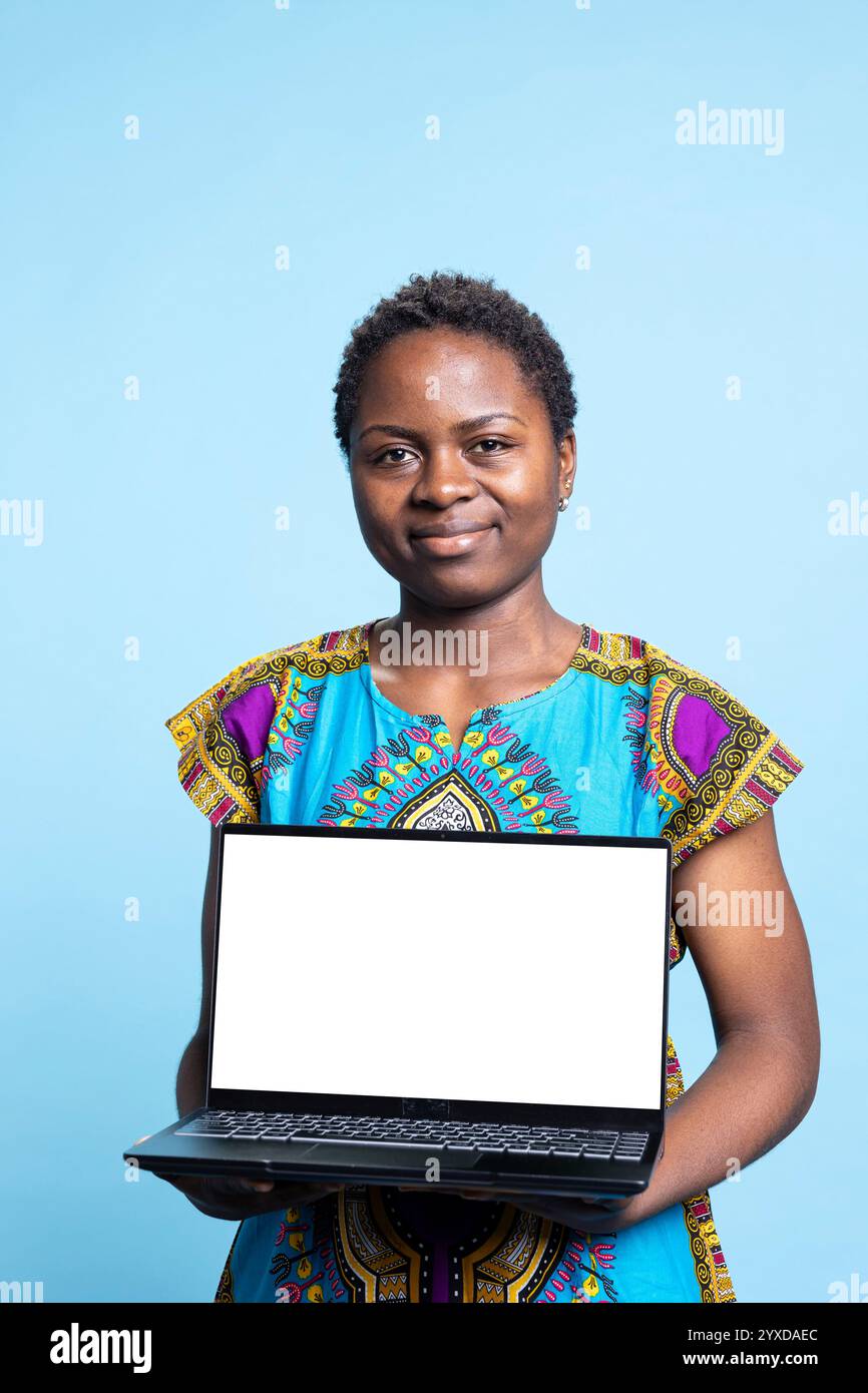 African american model creates ad commercial with white display on pc ...