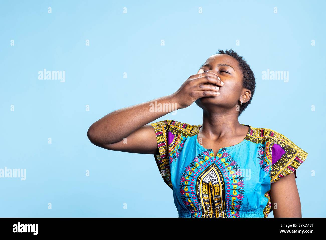 African american person feeling tired in front of camera, yawning and ...