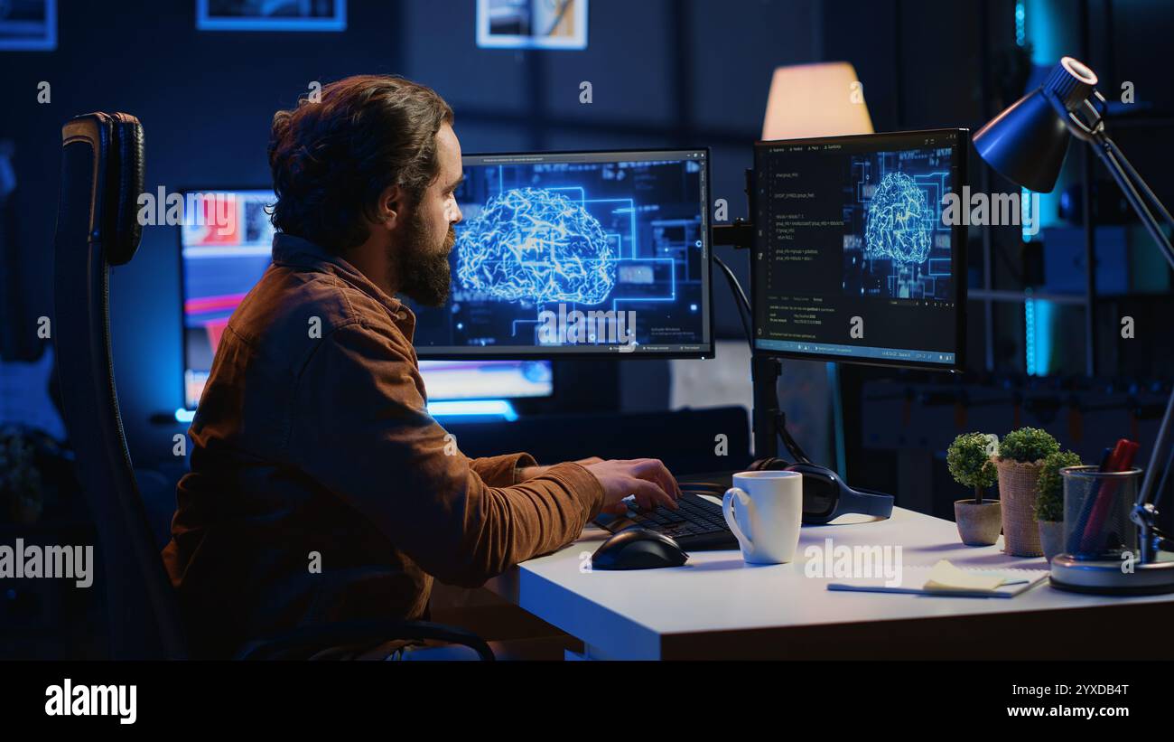 Freelancing computer scientist typing hi-res stock photography and ...