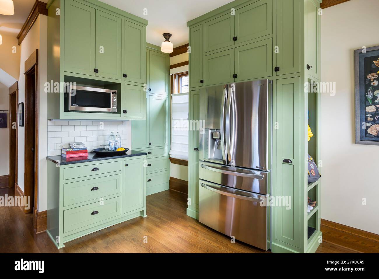 Corner of newly remodeled kitchen showing built-in fridge and other ...