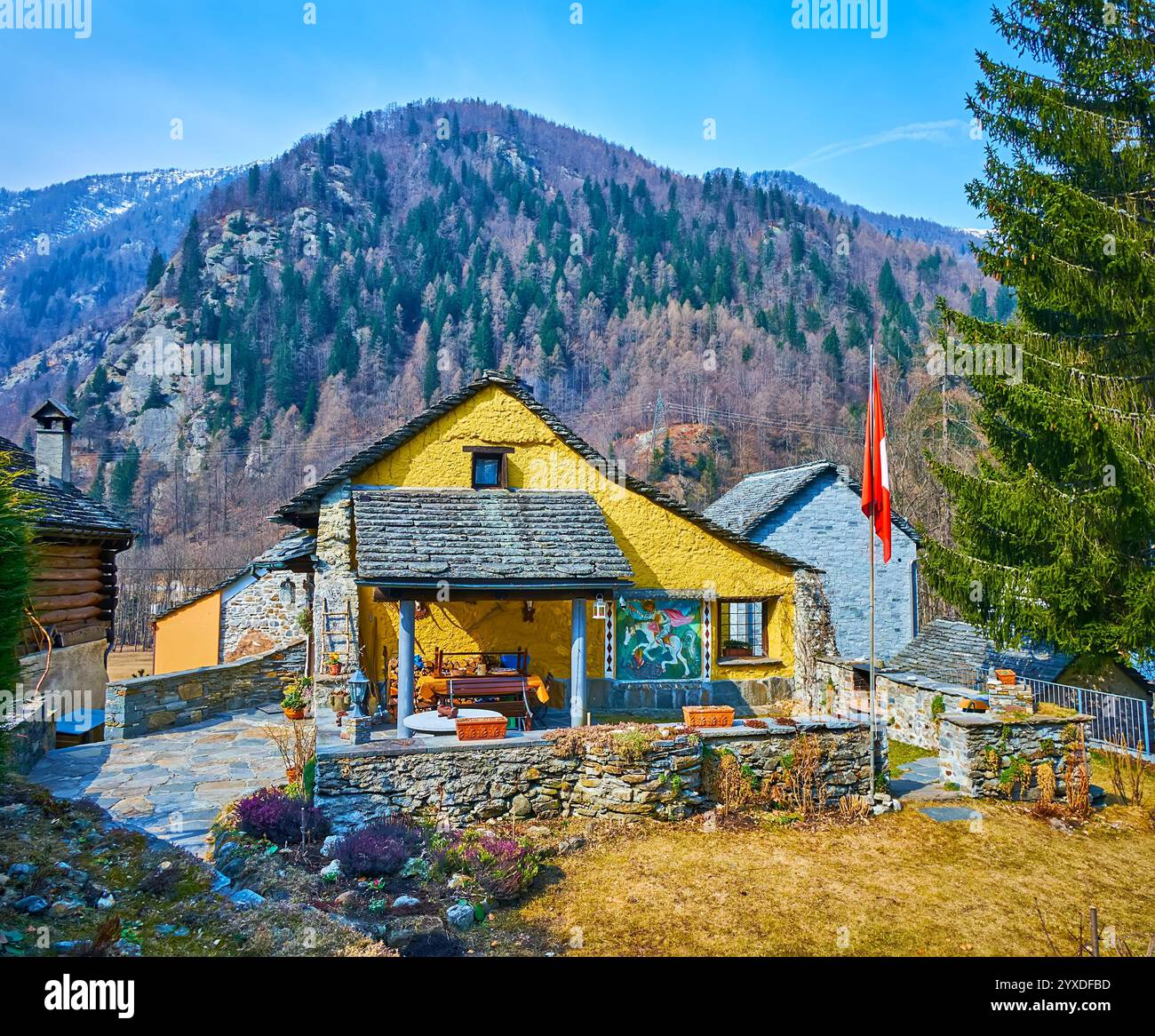 The bright yellow house with colorful mural of St George, killing the ...