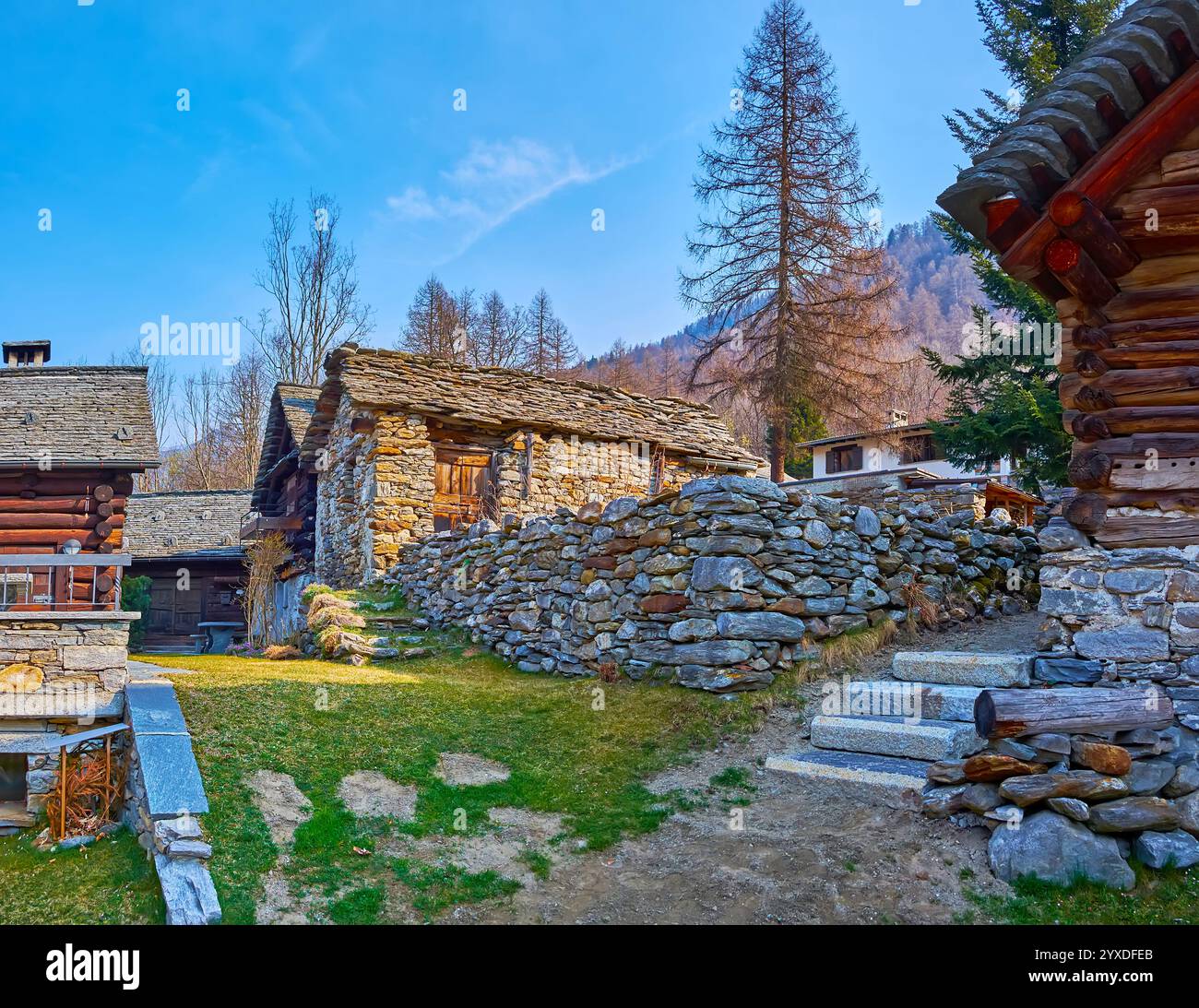 The old stone torba houses with piode roofs of stone slabs in Mogno ...