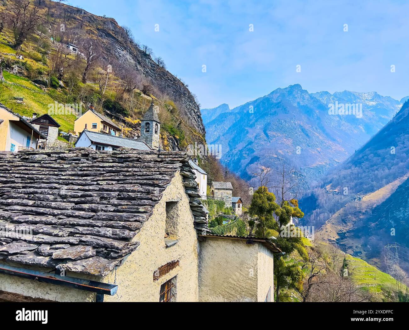 The traditional Ticinese piode house roof, made of the stone slabs, set ...
