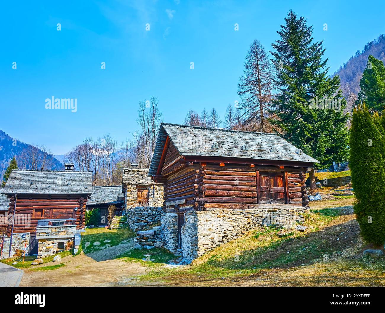 Traditional stone-timber Alpine houses with piode stone slabs roofs ...