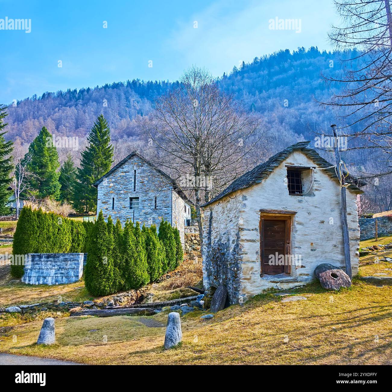 The small water mill and traditional Ticinese stone torba houses of ...