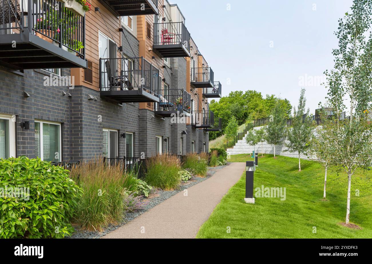 Side of apartment building showing balconies and plantings hi-res stock ...