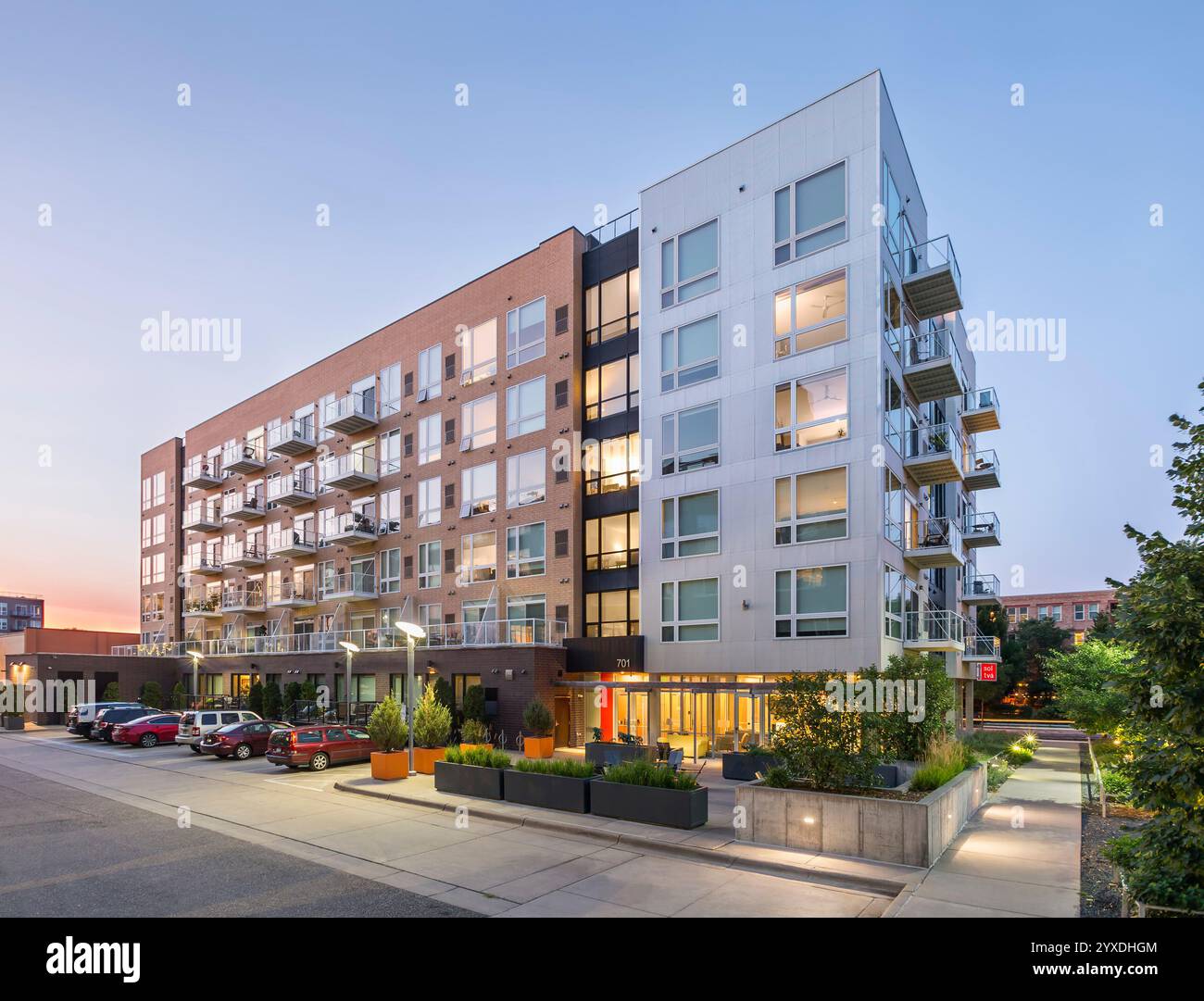 Back exterior of new apartment building at dusk hi-res stock ...