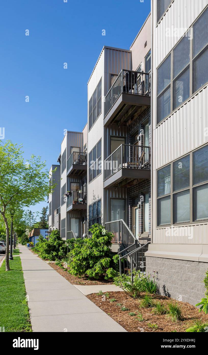 Front exterior of new apartment building seen from angle Stock Photo ...