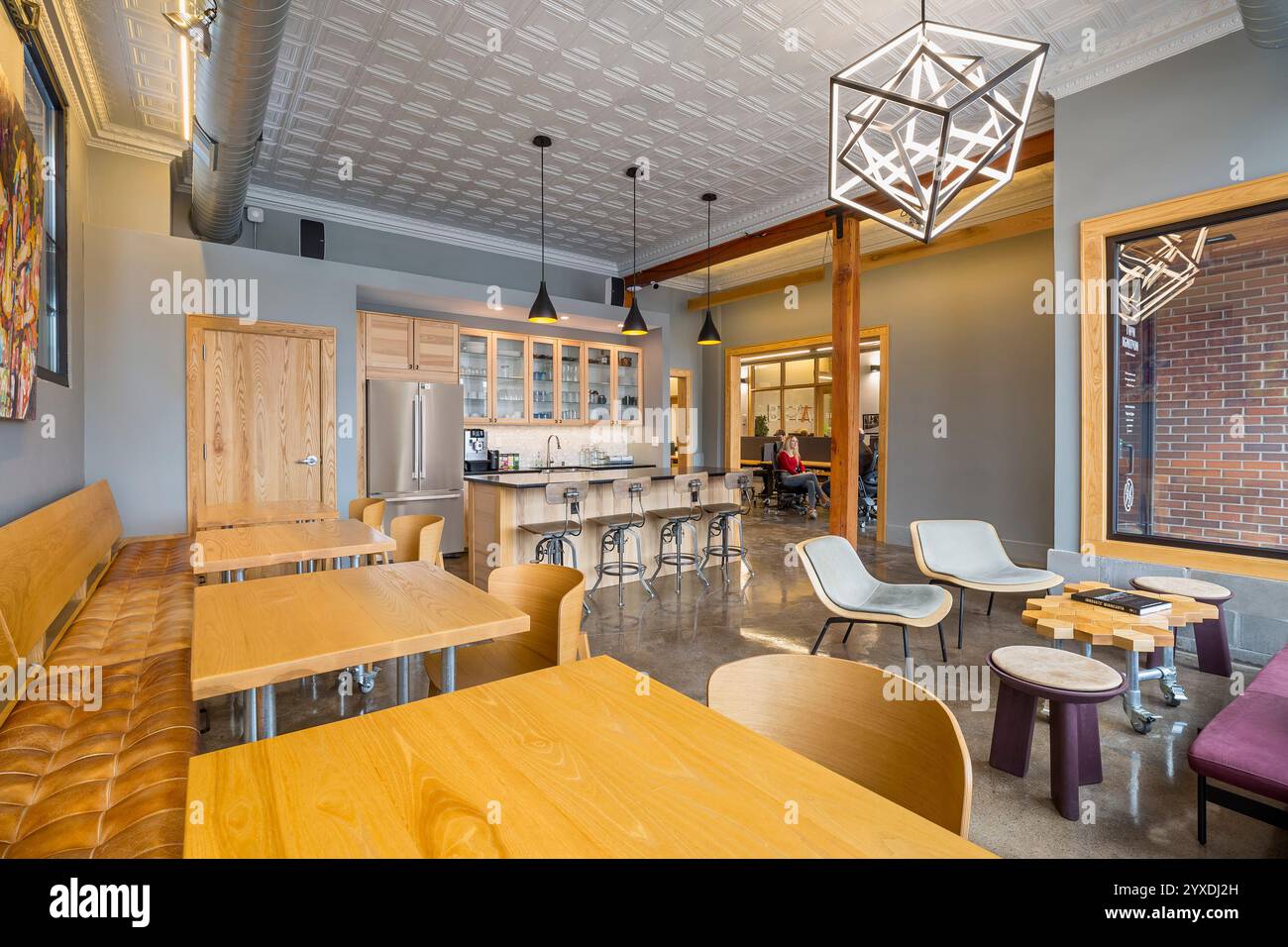 Kitchen and gathering area in new tech start-up business in former car ...