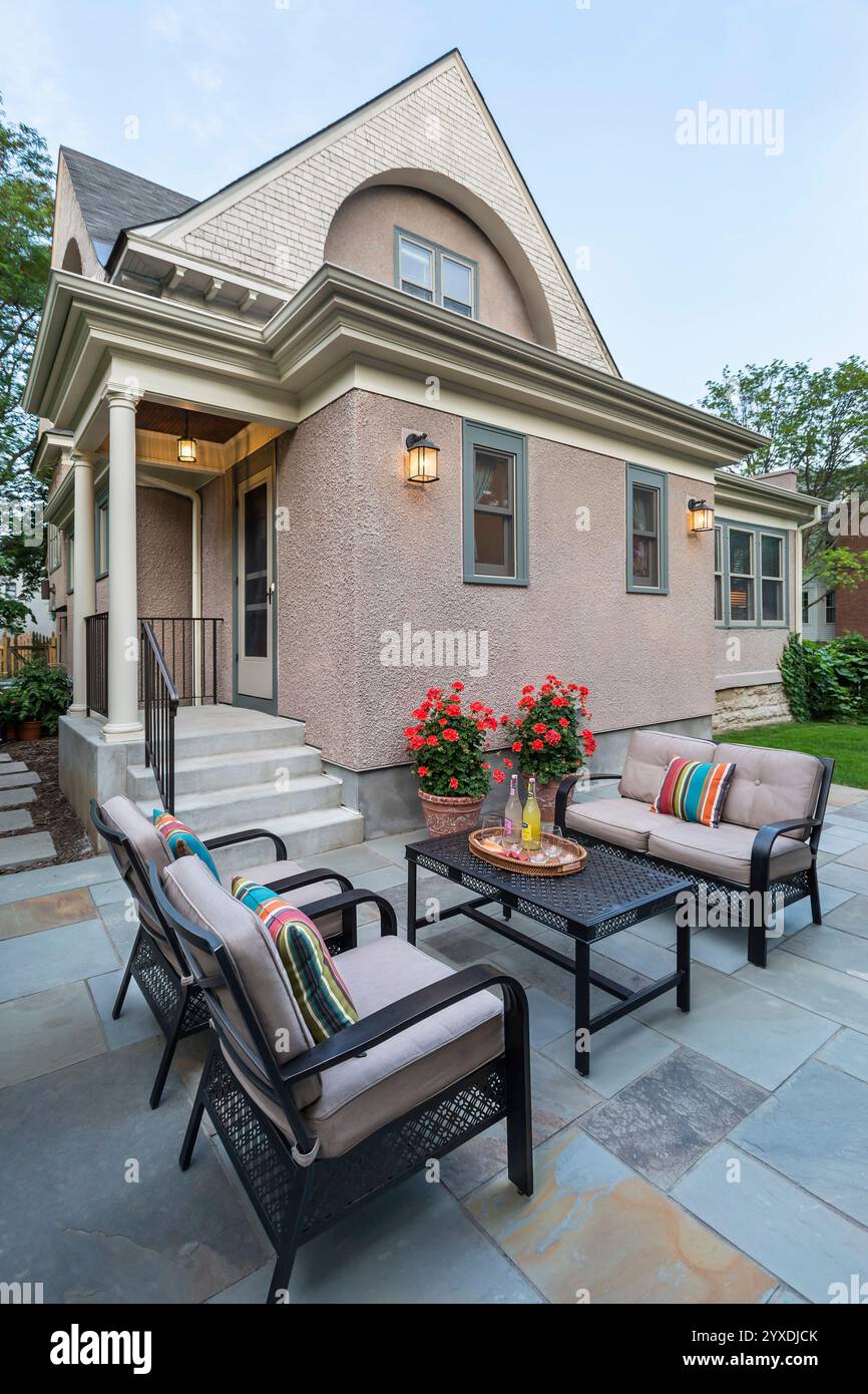 Back of house showing slate tile patio and back steps Stock Photo - Alamy