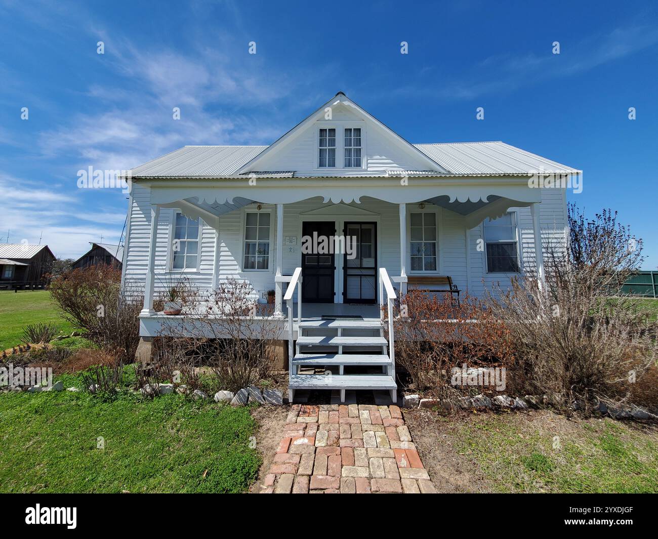 The Hluchanek-Salas House, a 1900s Texas-Czech farmhouse with white ...