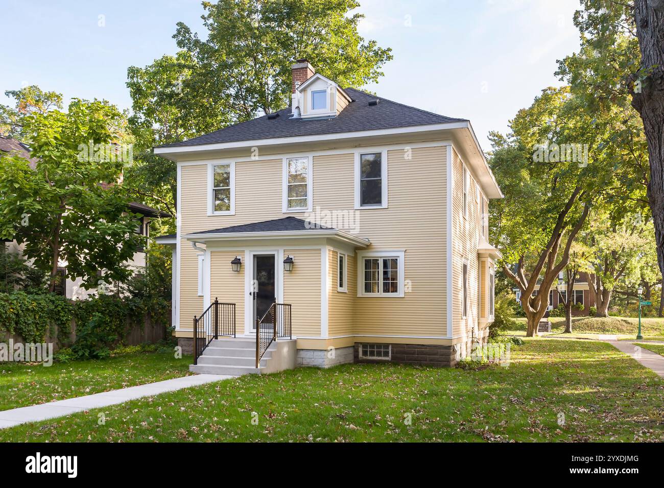 Back of remodeled older house with small bump-out for entryway/mudroom ...