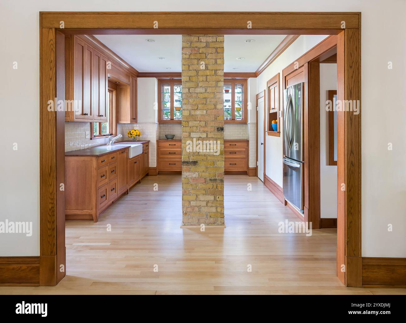 Brick furnace chimney is shown in middle of kitchen hi-res stock ...