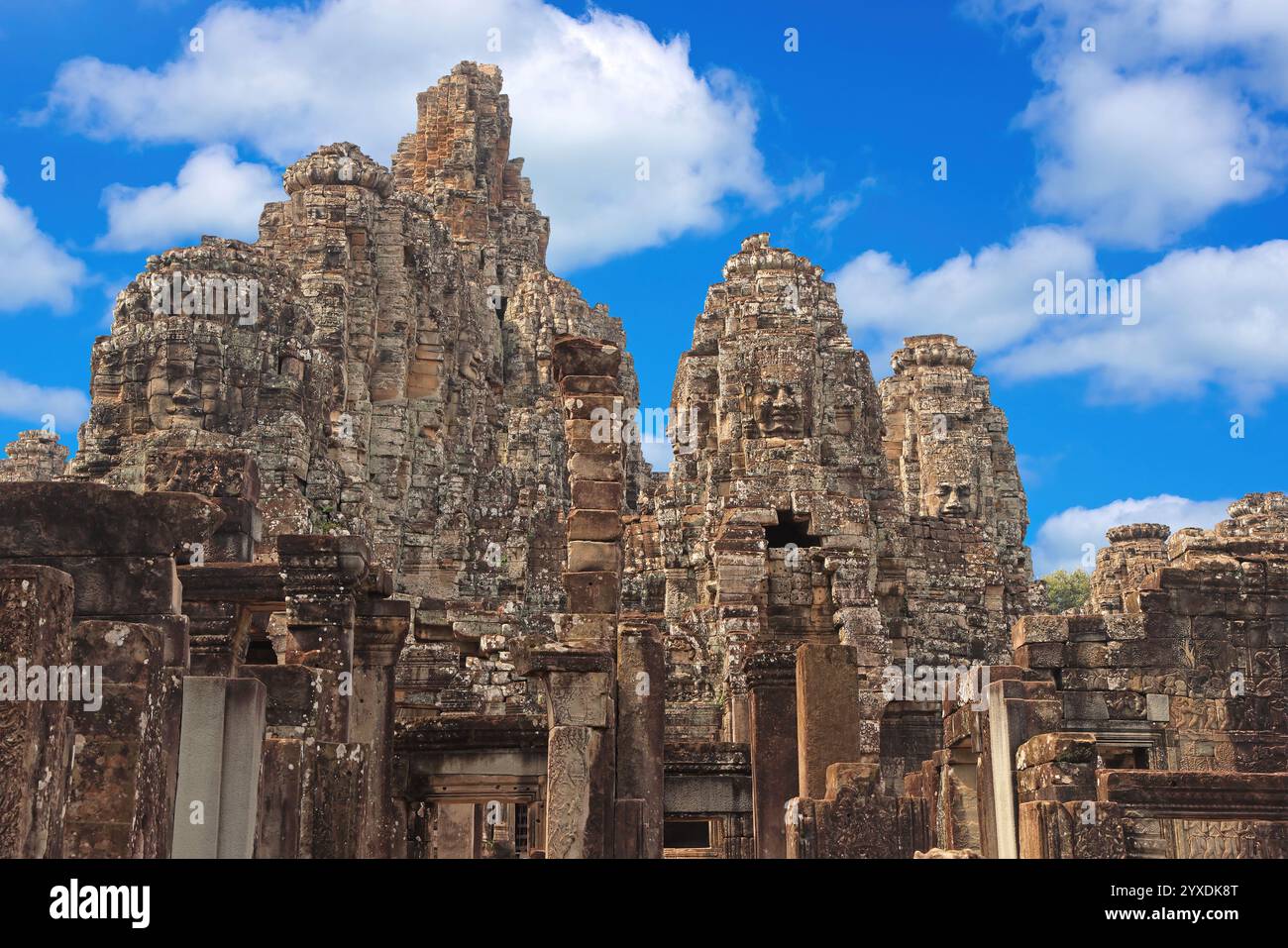 Ancient temple Bayon Angkor complex with stone faces of Buddha in Siem ...