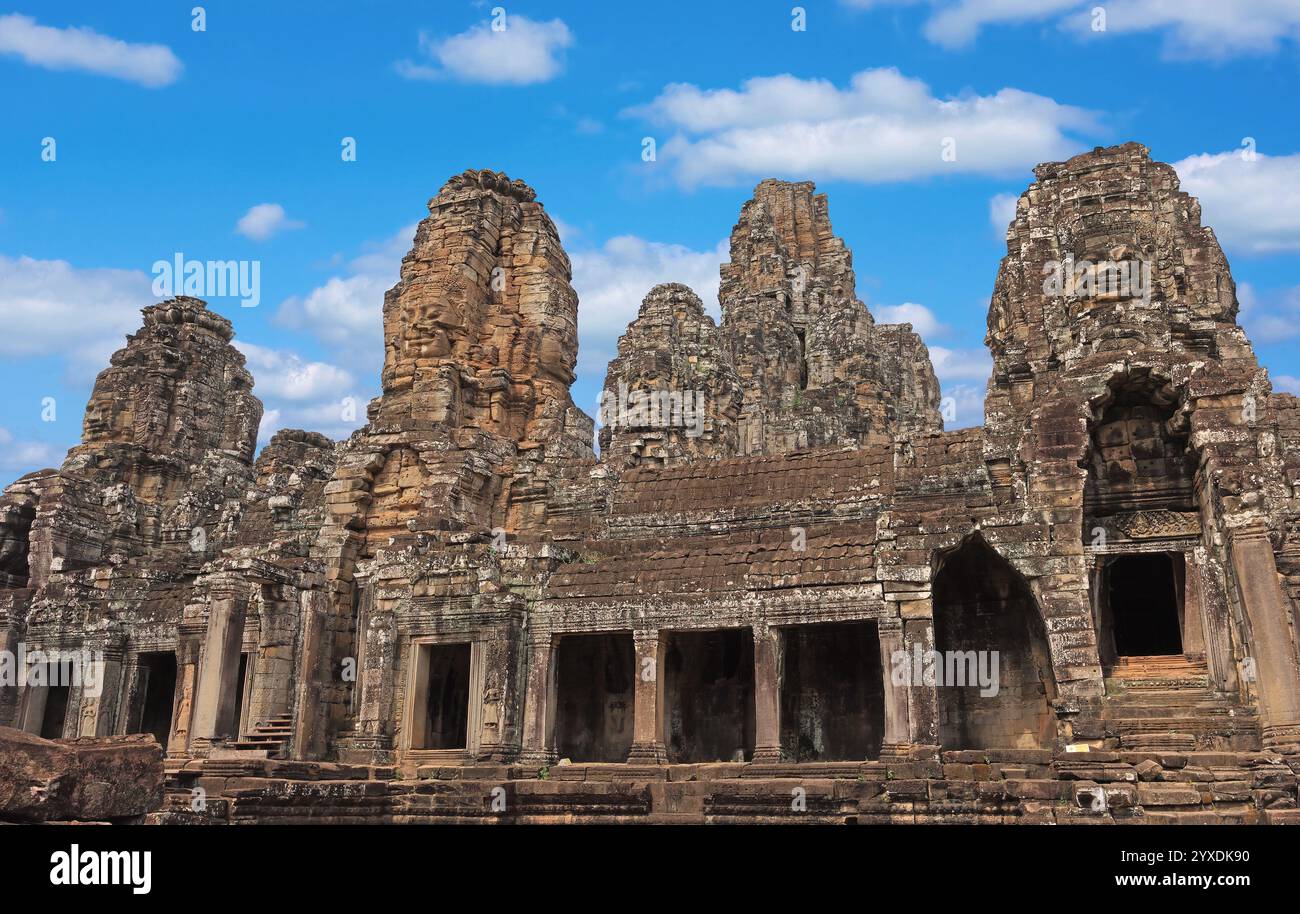 Ancient temple Bayon Angkor complex with stone faces of Buddha in Siem ...