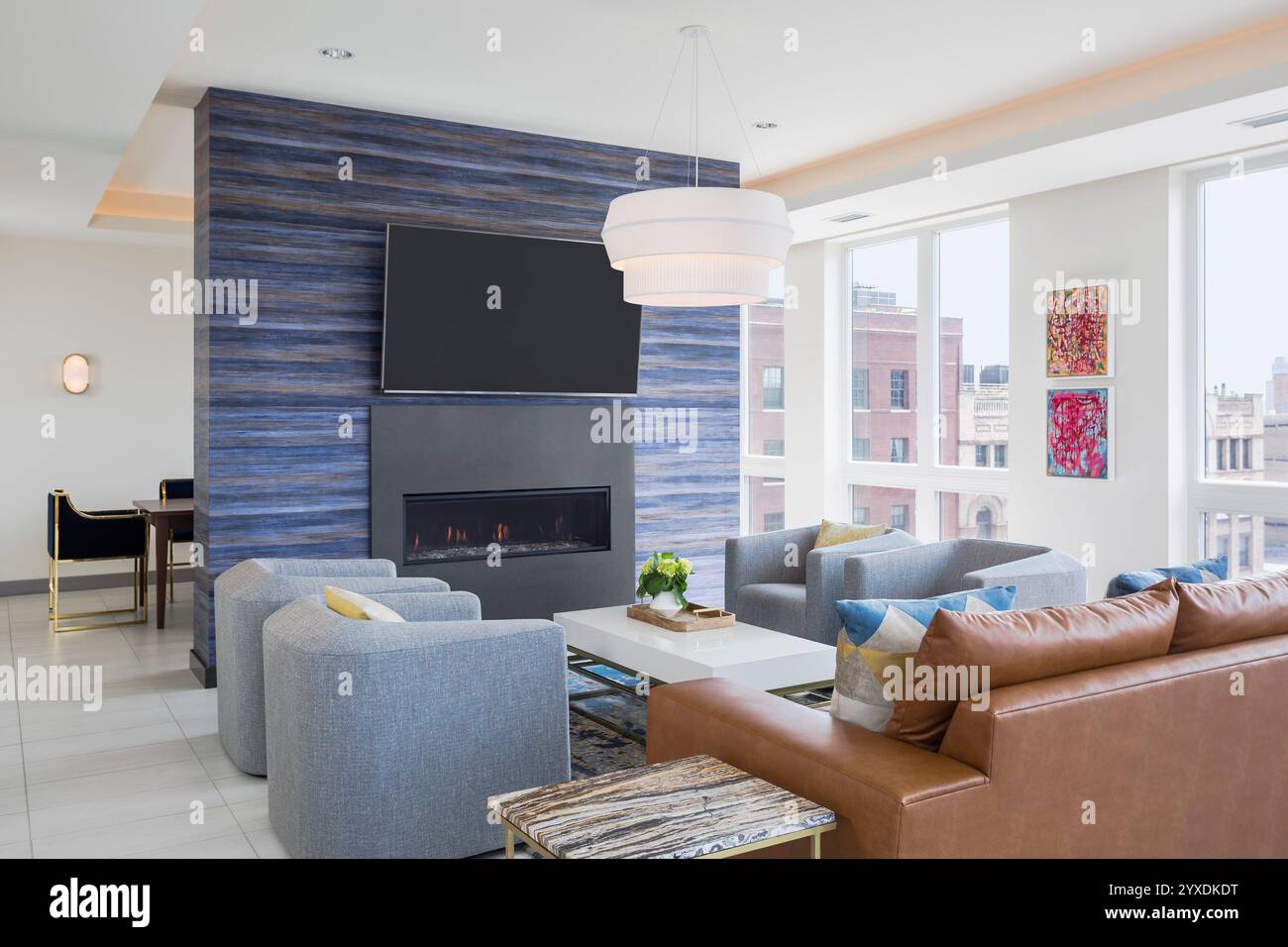 Freestanding two sided fireplace wall wrapped with blue streaked hi-res stock photography and ...