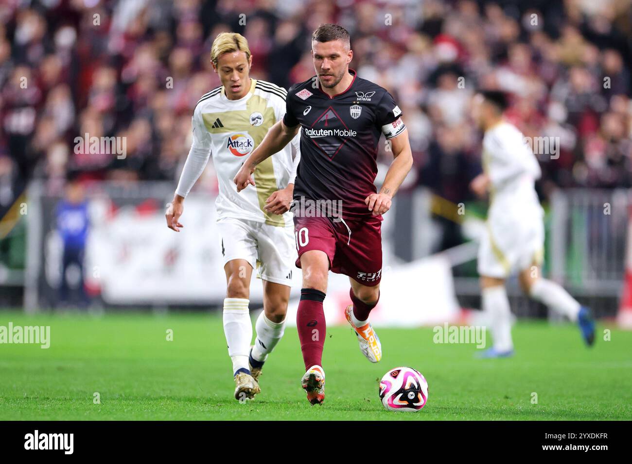 Hyogo, Japan. 14th Dec, 2024. (L-R) Keisuke Honda, Lukas Podolski ...