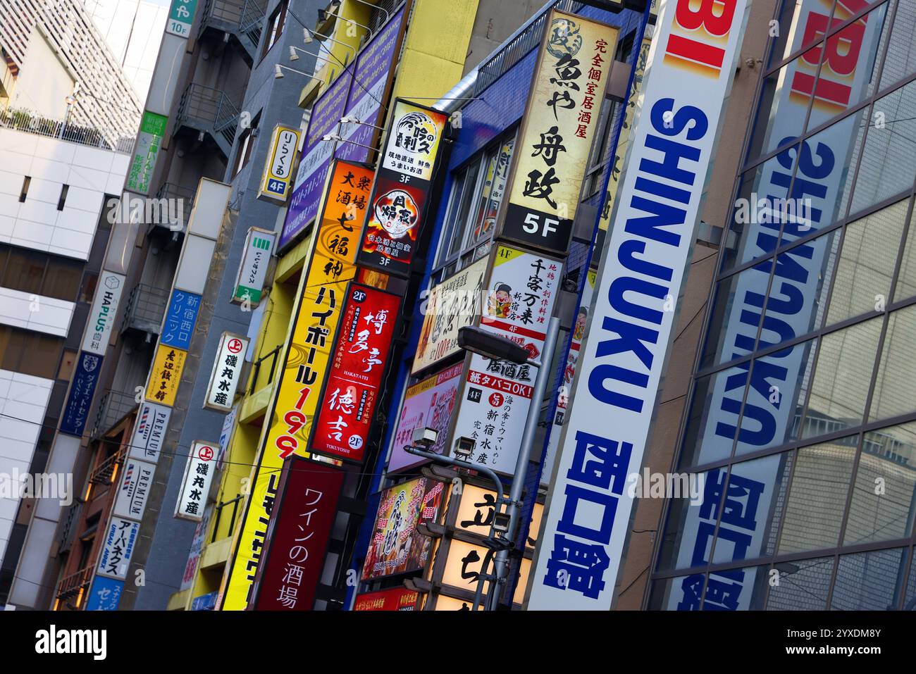 Signs on buildings in Shinjuku, Tokyo, Japan Stock Photo - Alamy
