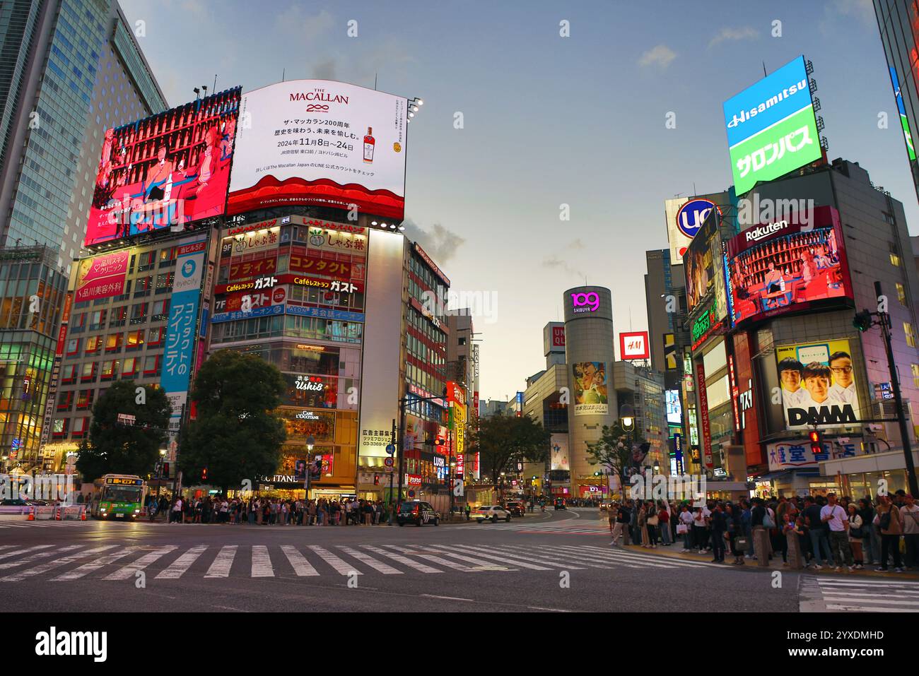 Buildings around the Shibuya Scramble Crossing at sunset in Shibuya ...