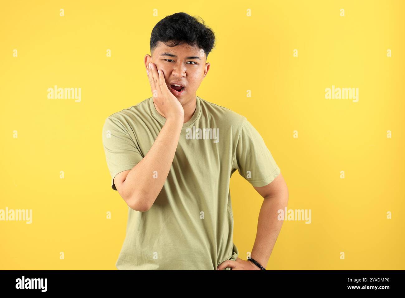 Asian man feel sensitive teeth hi-res stock photography and images - Alamy