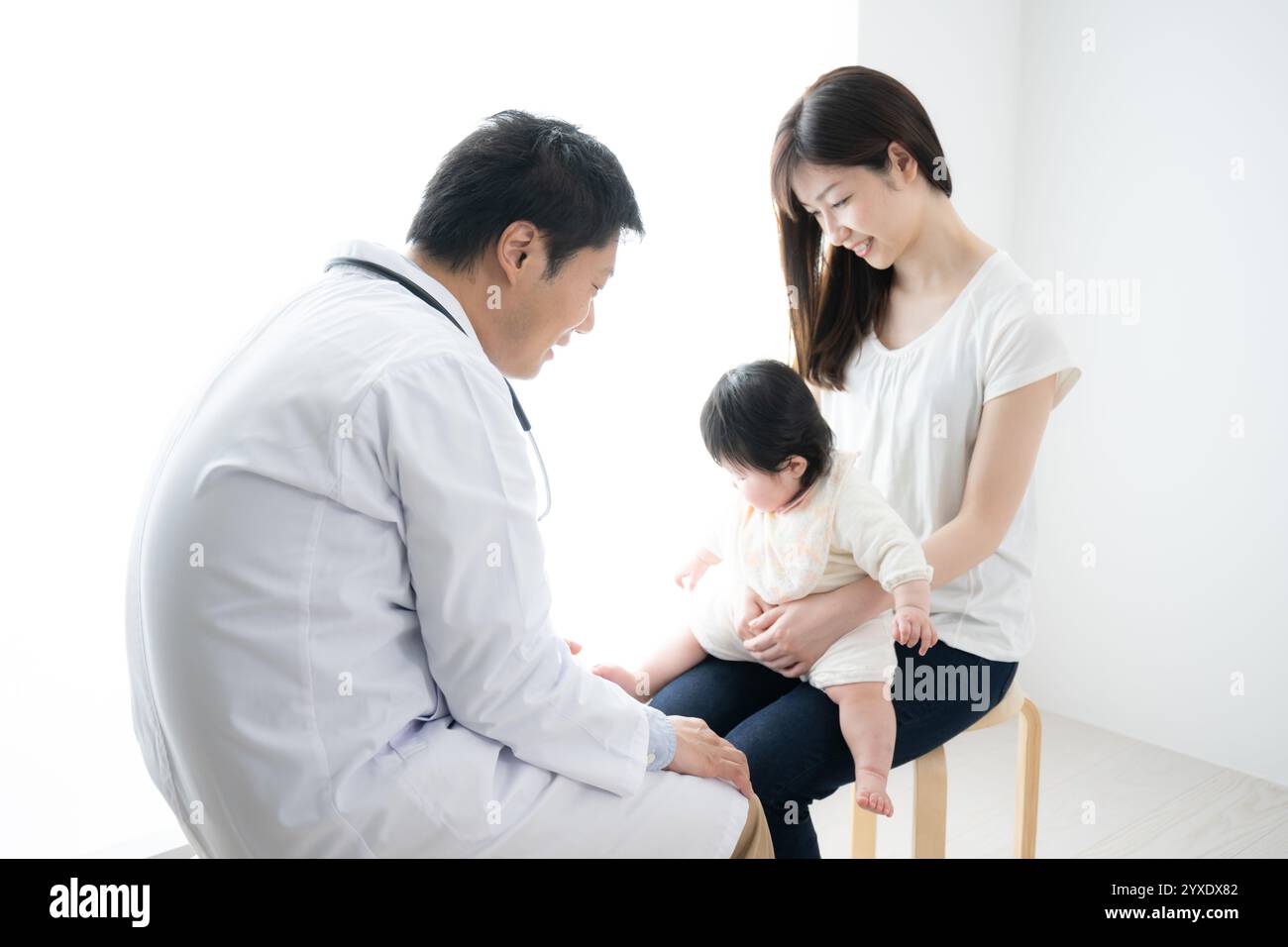 Baby's medical check-up Stock Photo - Alamy