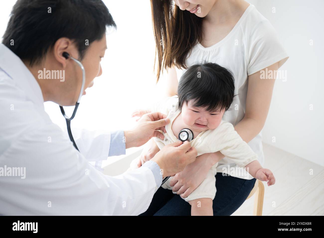 Baby's medical check-up Stock Photo - Alamy
