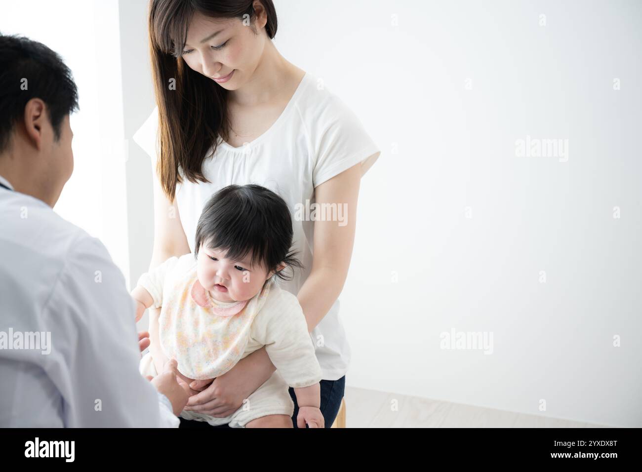 Baby's medical check-up Stock Photo - Alamy