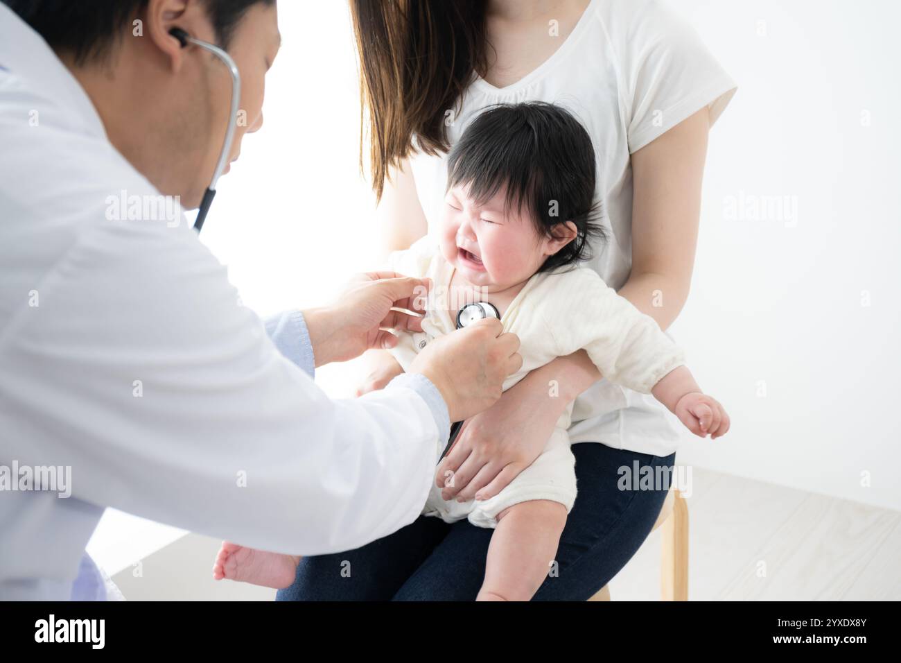 Baby's medical check-up Stock Photo - Alamy