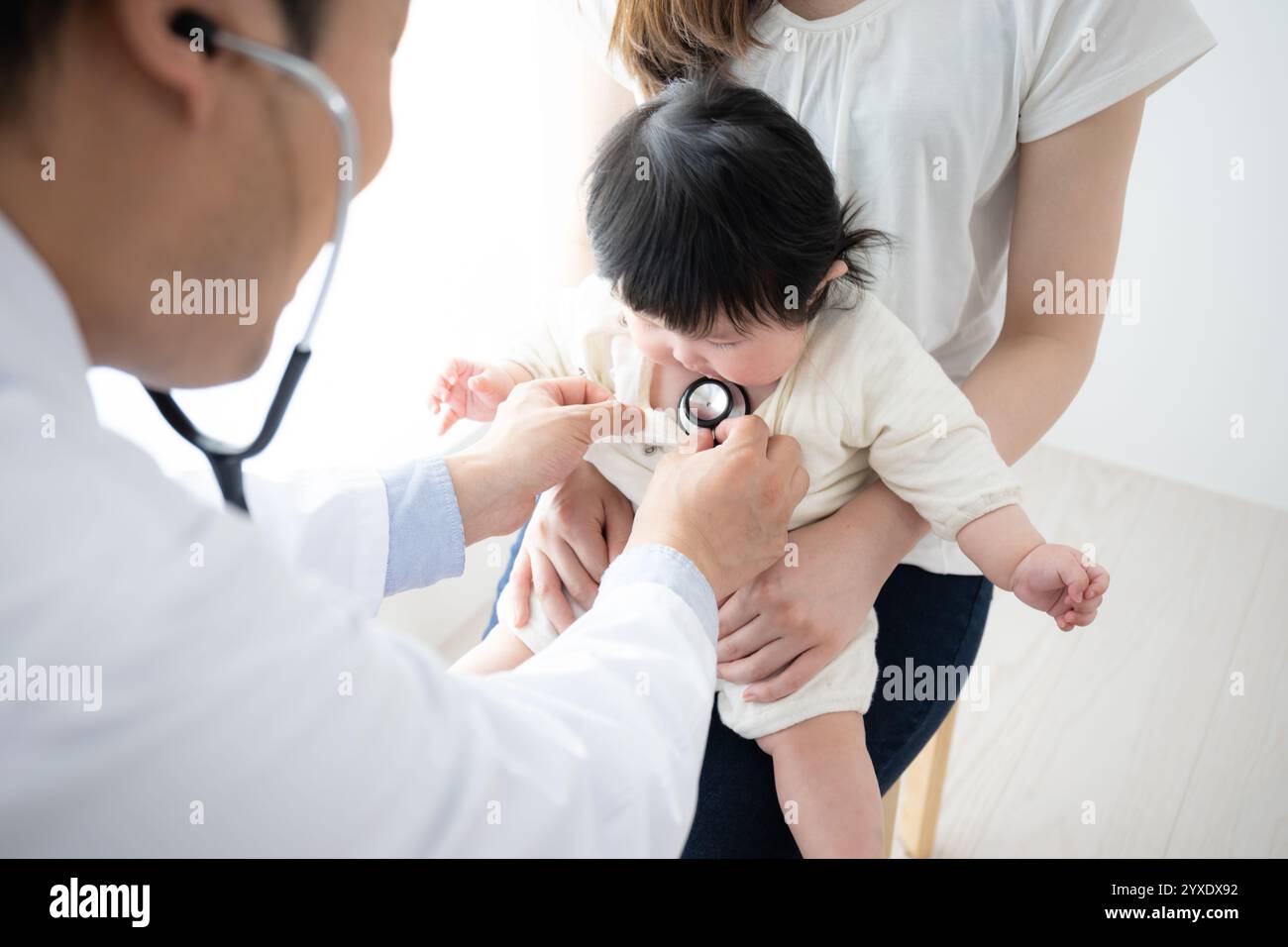 Baby's medical check-up Stock Photo - Alamy