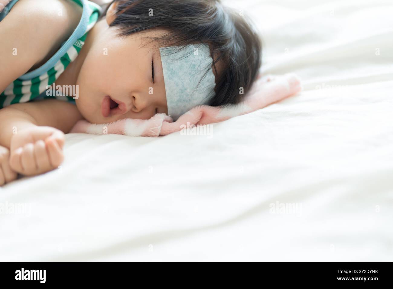Baby with a cold Stock Photo - Alamy