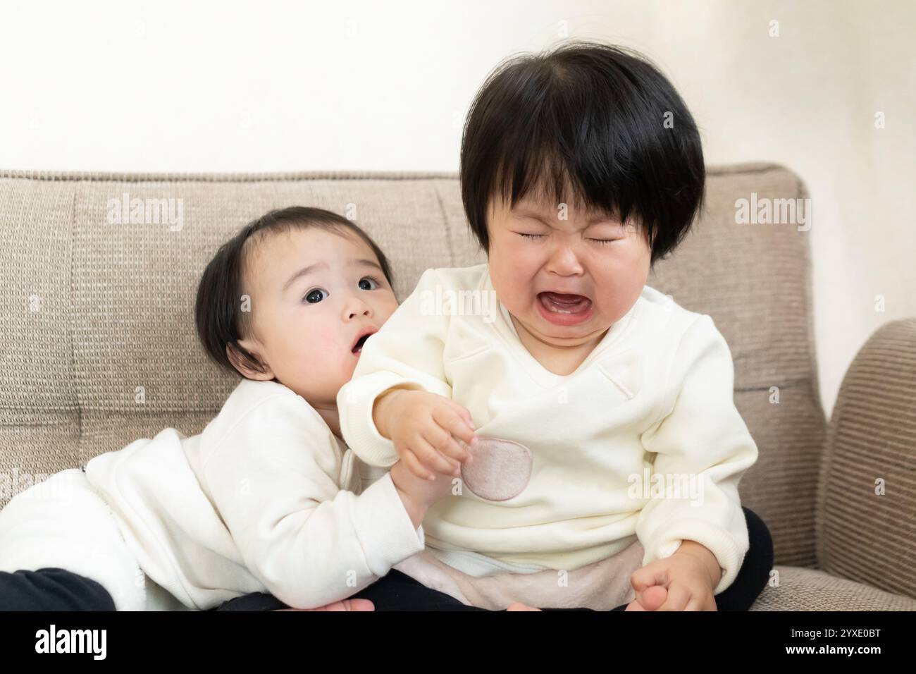Infant cry sit hi-res stock photography and images - Alamy